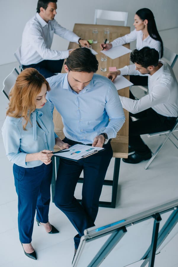 High Angle View of Business Coworkers Having Discussion during Business ...