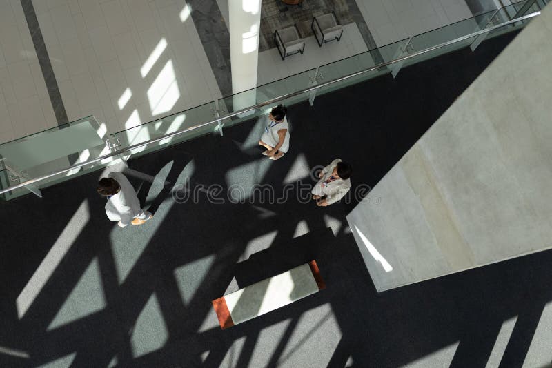 High Angle View of Business People Arriving at Office Lobby Stock Photo ...
