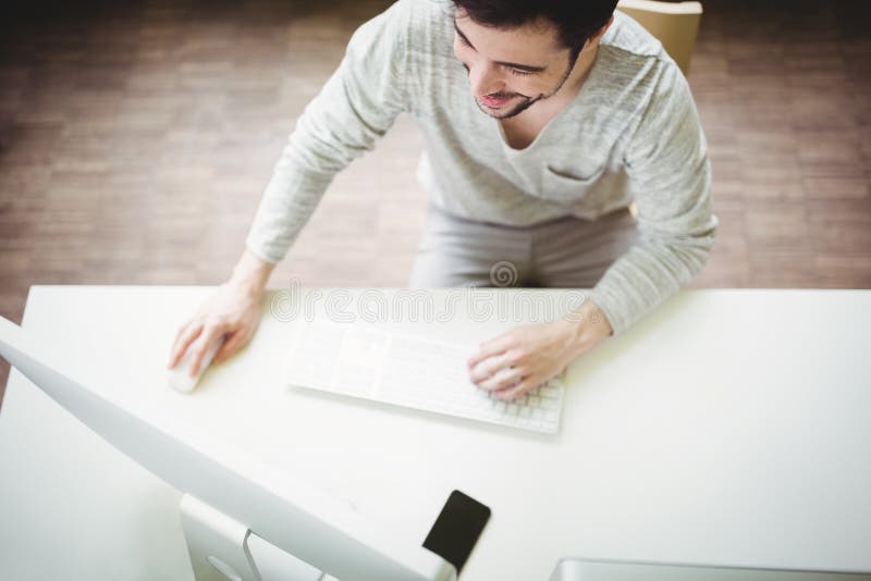 High Angle View of Businessman Working on Computer Stock Image - Image ...
