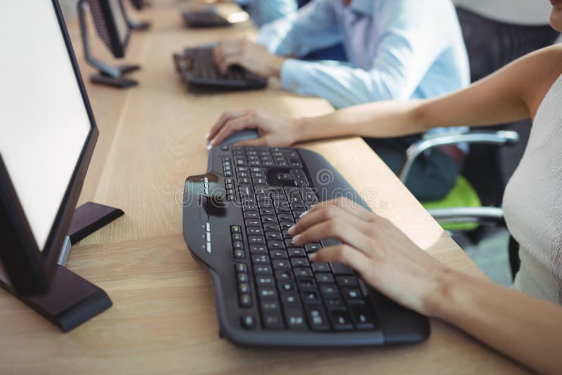 High Angle View of Businesswoman Working on Computer at Call Center ...