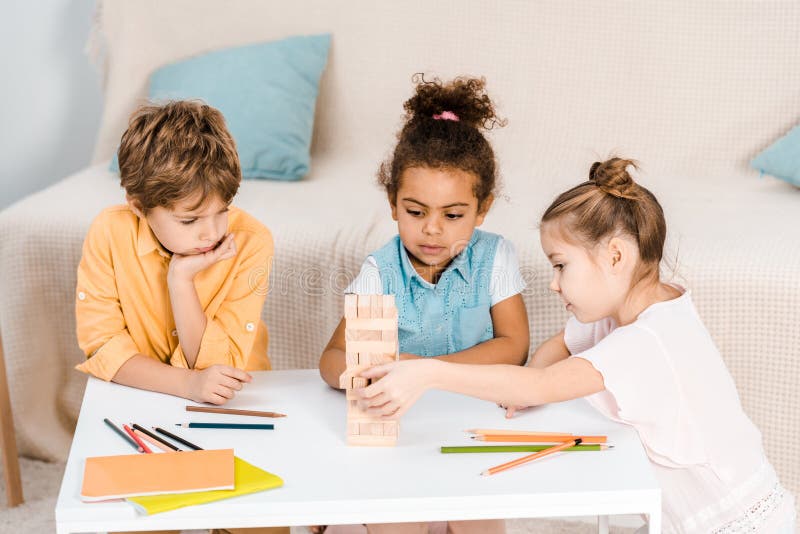 High Angle View of Children Building Tower from Wooden Blocks Stock ...
