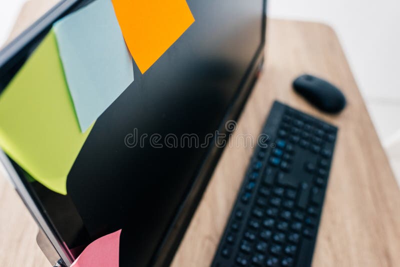 High Angle View of Colorful Post Its on Blank Computer Monitor Stock ...