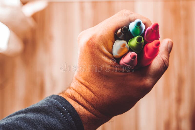 High Angle View of Colors and Human Hand Stock Image - Image of face ...