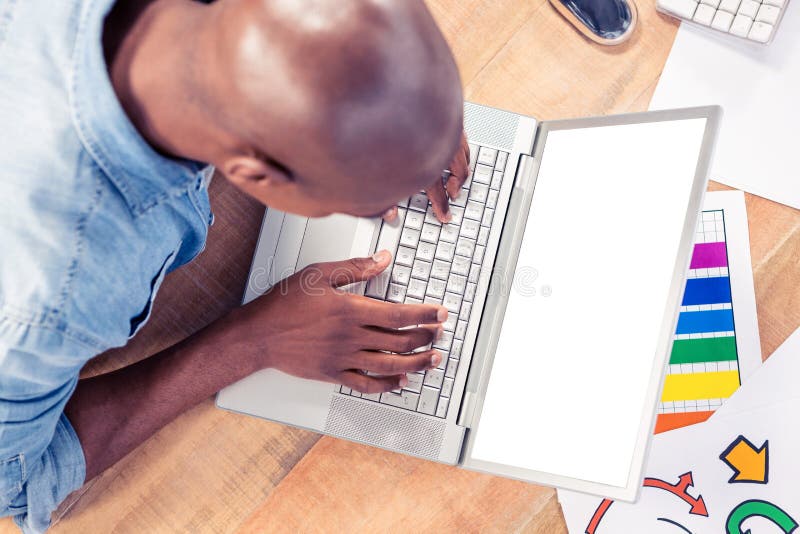 High Angle View of Creative Businessman Working on Laptop Stock Photo ...