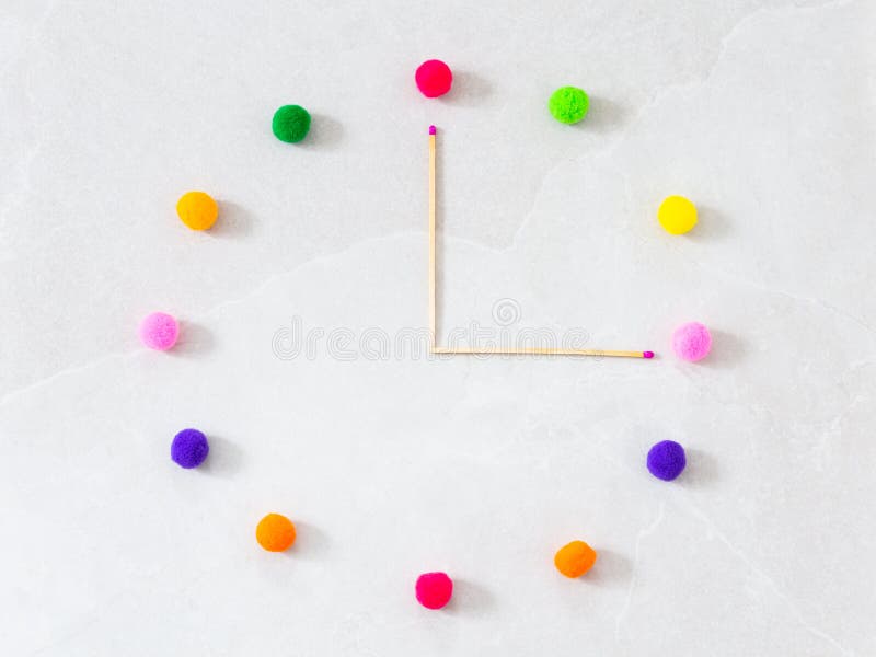 High Angle View of Cute Clock Shape Made with Colourful and Matchsticks ...