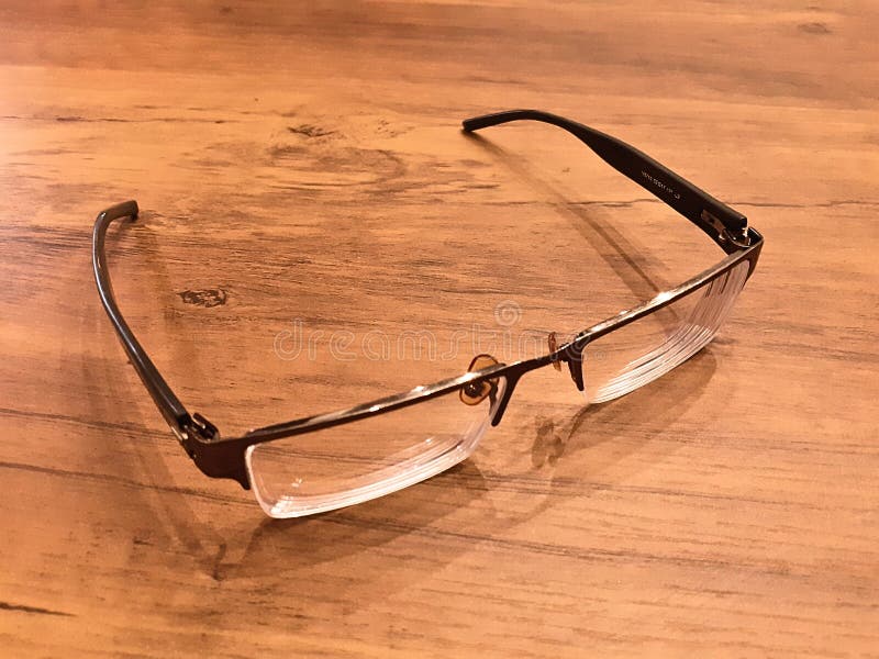 High Angle View of Eyeglasses on the Table Stock Image - Image of ...