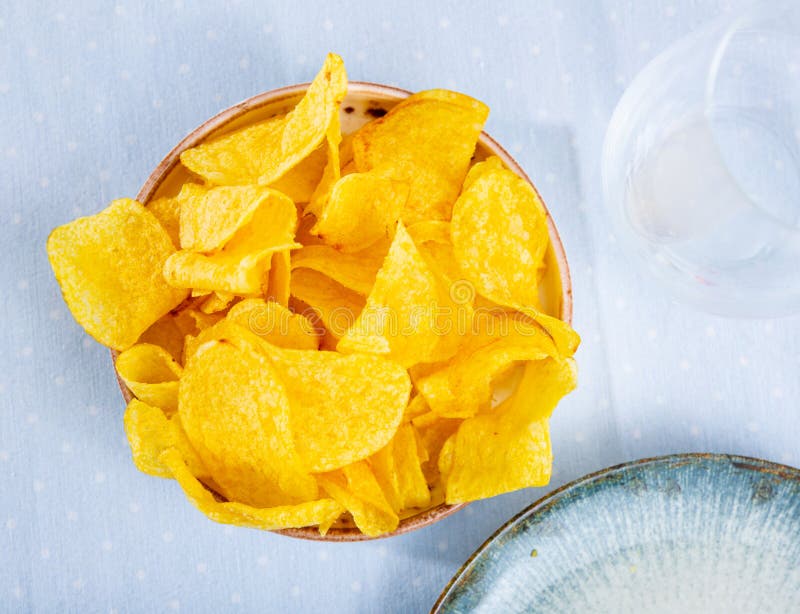 High Angle View of Fresh Crunchy Potato Chips on Table Closeup Stock ...