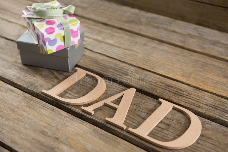 High Angle View of Gift Boxes by Dad Text on Table Stock Image - Image ...
