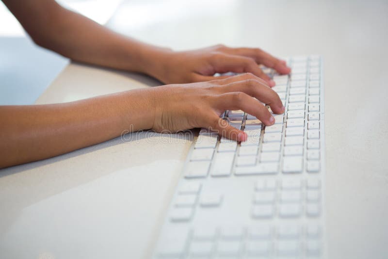 High Angle View of Girl Typing on White Computer Keyboard Stock Photo ...