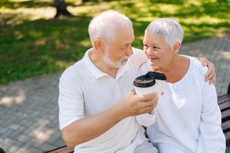 High-angle View of Happy Elderly Couple Enjoy Conversation in Park ...