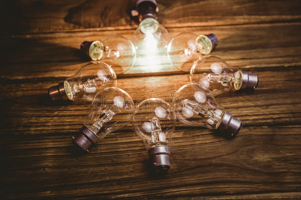 High Angle View of Illuminated Light Bulb Stock Illustration ...