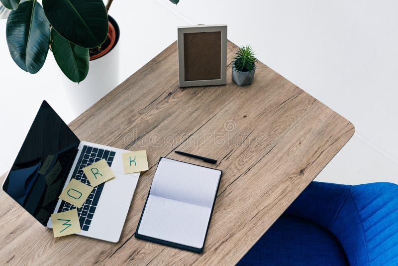 High Angle View of Laptop with Blank Screen, Lettering Work on Post Its ...