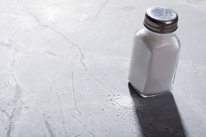 High Angle View of Light Falling on Salt Shaker at Table Stock Image ...