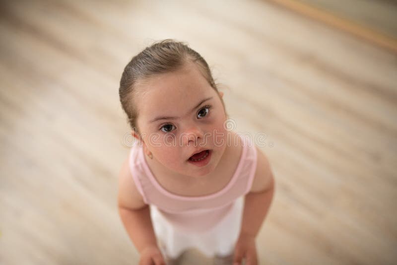 High Angle View of Little Girl with Down Syndrome at Ballet Class in ...