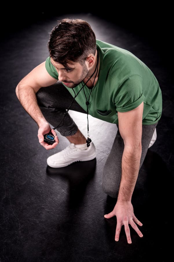 High Angle View of Man Holding Stopwatch Stock Photo - Image of ...
