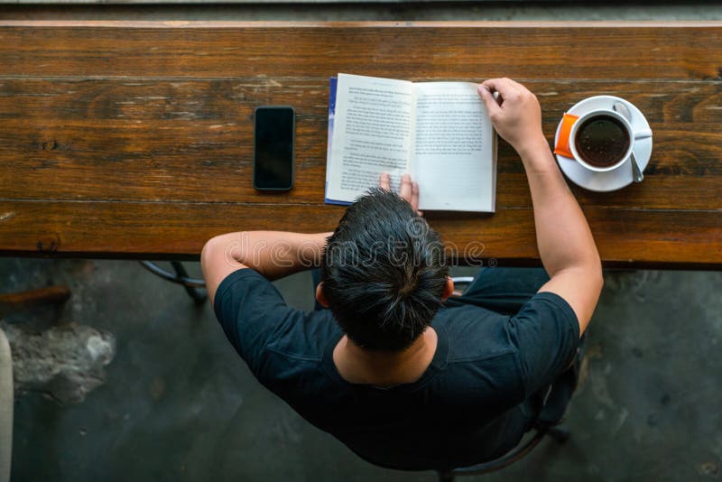 High Angle View of Man Reading Book Stock Image - Image of business ...