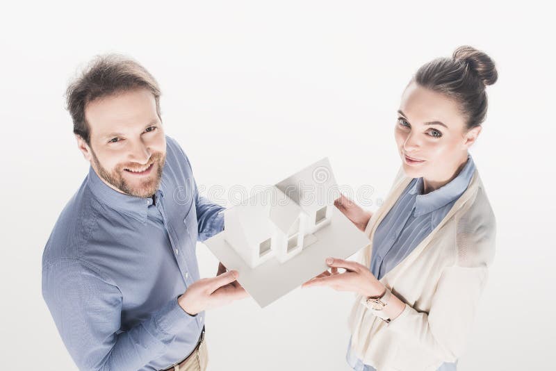 High Angle View of Married Couple Holding House Model Together Stock ...