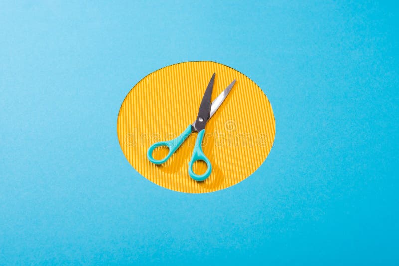 High Angle View of Metal Scissors on Yellow Circle. Stock Photo - Image ...