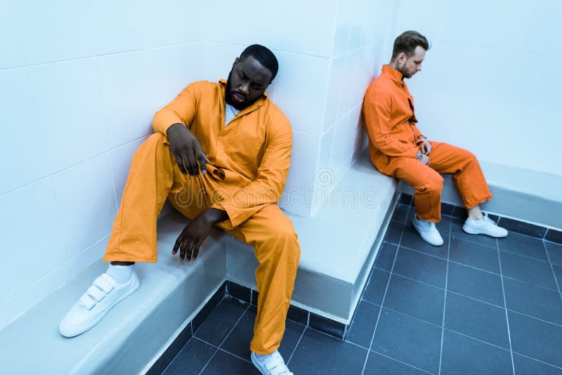 High Angle View of Multicultural Prisoners Sitting on Benches Stock ...
