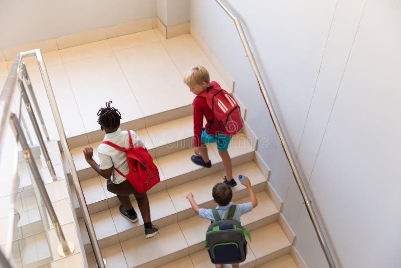 High Angle View of Multiracial Elementary Schoolboys with Backpack ...