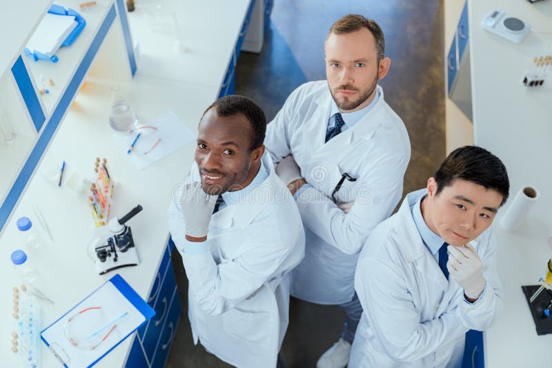 High Angle View of Multiracial Group of Scientists Standing Together ...