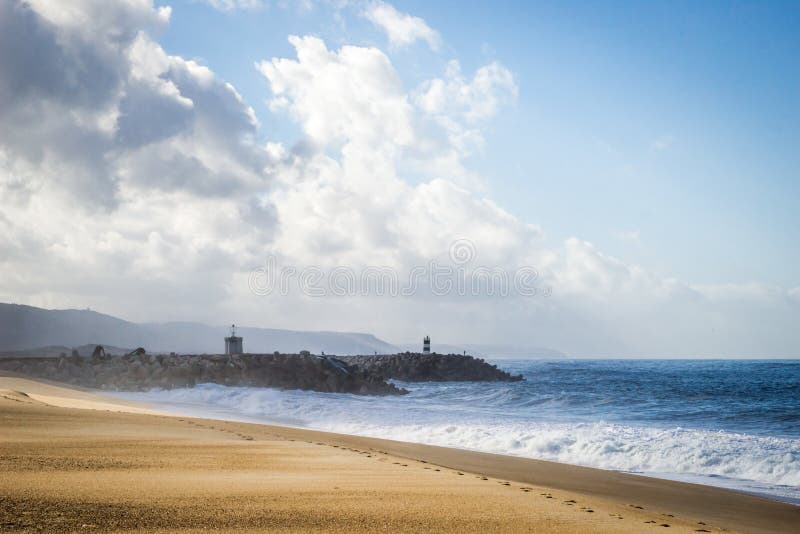 High Angle View of the Nazare Beach in Portugal Under the Cloudy Sky ...