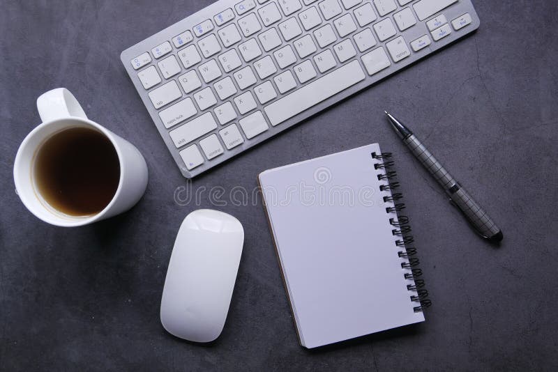 High Angle View of Notepad Keyboard and Mouse on Table Stock Image ...