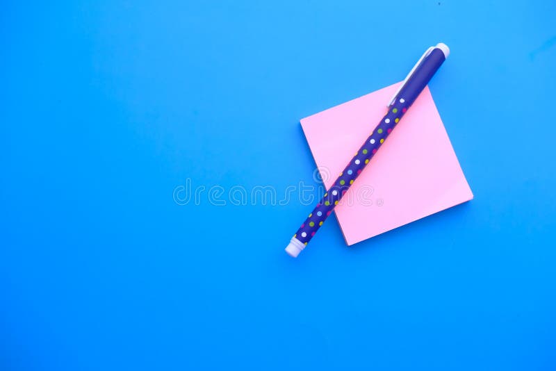 High Angle View of Notepad and Pen on Blue Background Stock Photo ...