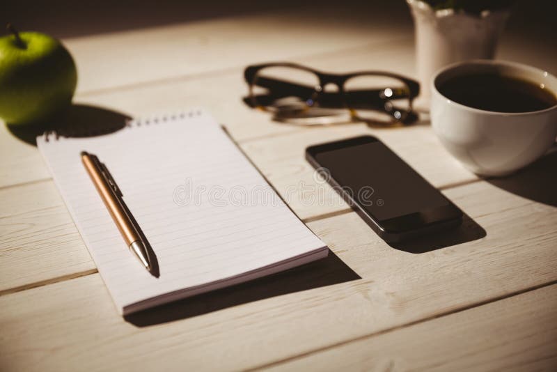 High Angle View of Notepad by Smart Phone Stock Photo - Image of ...