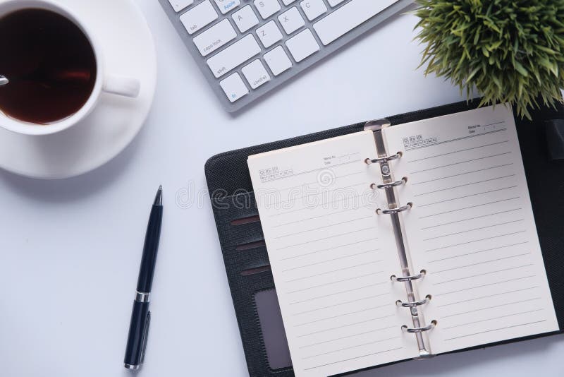 High Angle View of Open Diary, Tea and Keyboard on Office Desk. Stock ...