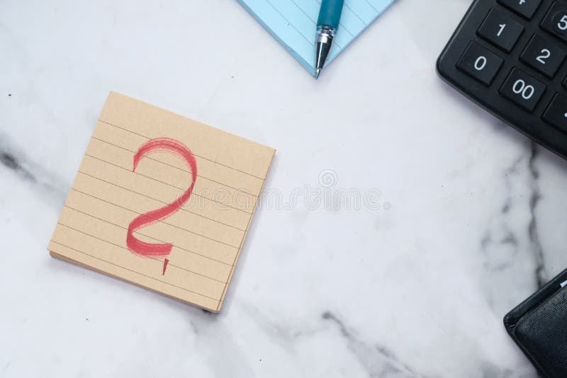 High Angle View of Question Mark on Paper on Office Desk Stock Photo ...