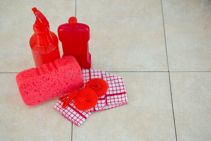 High Angle View of Red Cleaning Products with Napkin Stock Photo ...