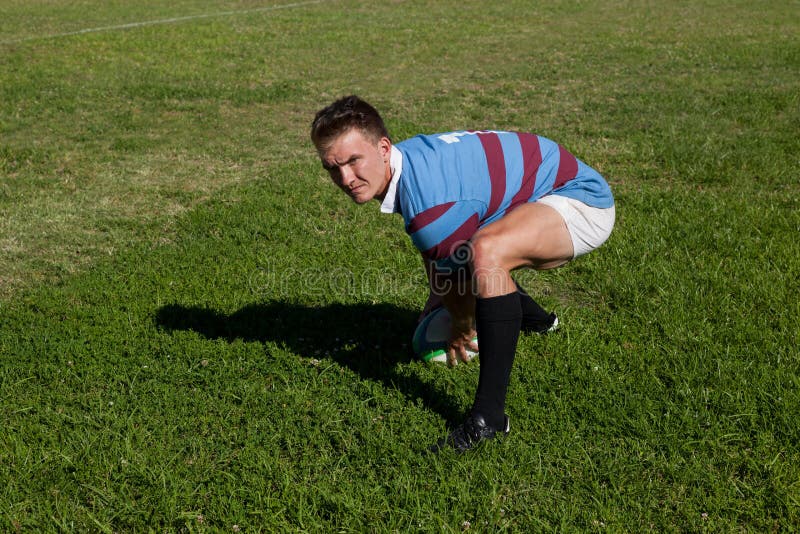 High Angle View of Rugby Player Crouching on Field Stock Photo - Image ...