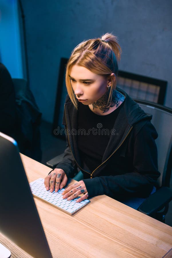High Angle View of Serious Young Female Hacker Stock Photo - Image of ...