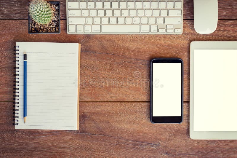 High Angle View of a Setting Table Computer, Phone, Tablet of Bu Stock ...