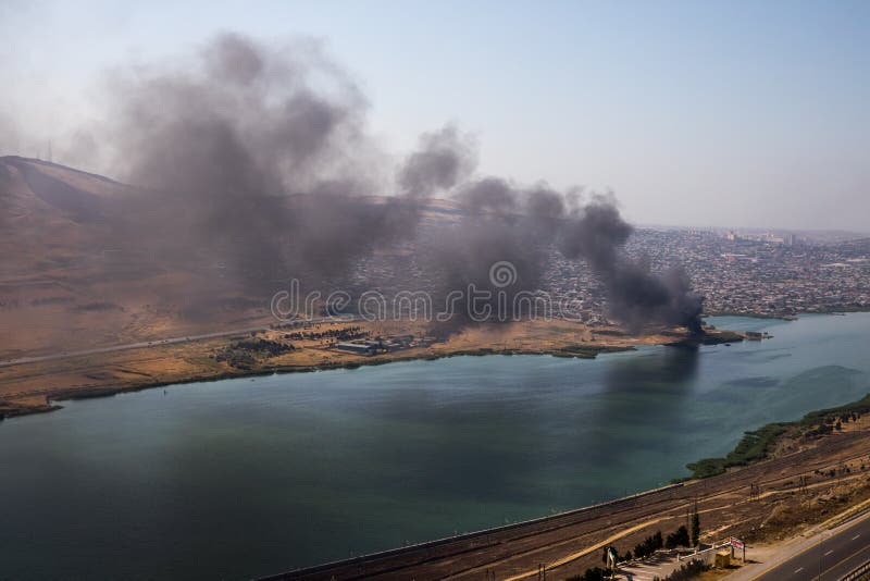 High Angle View of Smoke Spreading from Building. Arson of Industrial ...