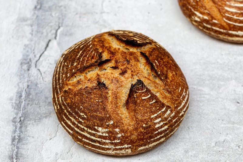 Sourdough Loaves on a Marble Table Top, with a Shallow Depth of Field ...