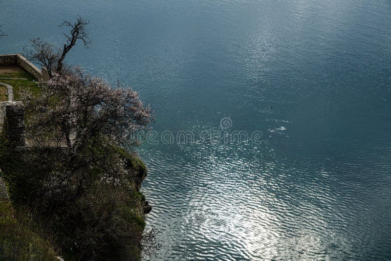 Cliff on lake Ohrid stock image. Image of coast, calm - 242531843