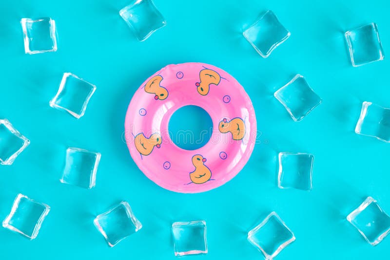 High Angle View of Swimming Pool Float and Ice Cubes Abstract on Blue ...
