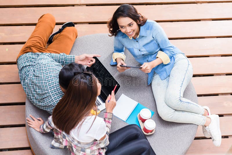 Three Creative Employees Sharing Ideas during Brainstorming Sess Stock ...