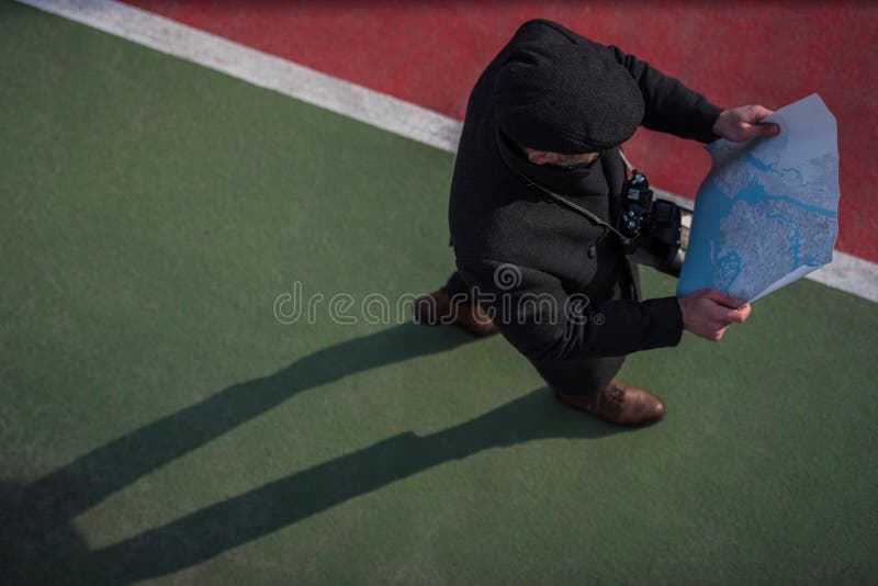 High Angle View of Tourist in Coat and Cap Walking Stock Photo - Image ...