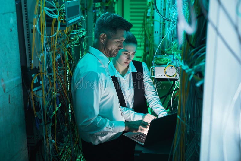 Portrait of Network Engineer in Server Room Stock Image - Image of data ...