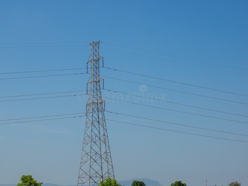 High Angle View of High Voltage Cable Pole on Blue Sky Background ...