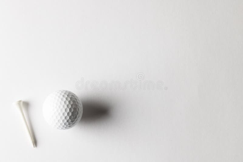 High Angle View of White Golf Ball and Golf Tee with Copy Space on ...