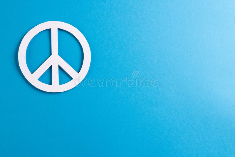 High Angle View of White Peace Sign with Copy Space on Blue Background ...