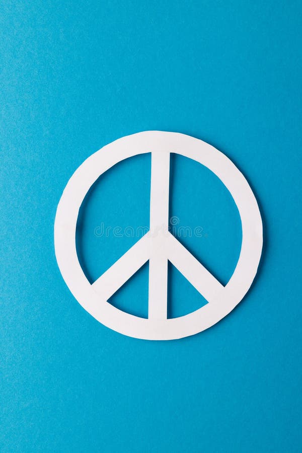 High Angle View of White Peace Sign with Copy Space on Blue Background ...