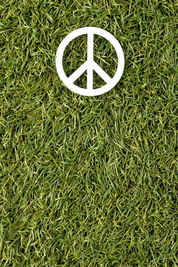 High Angle View of White Peace Sign with Copy Space on Grass Background ...