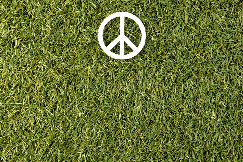 High Angle View of White Peace Sign with Copy Space on Grass Background ...