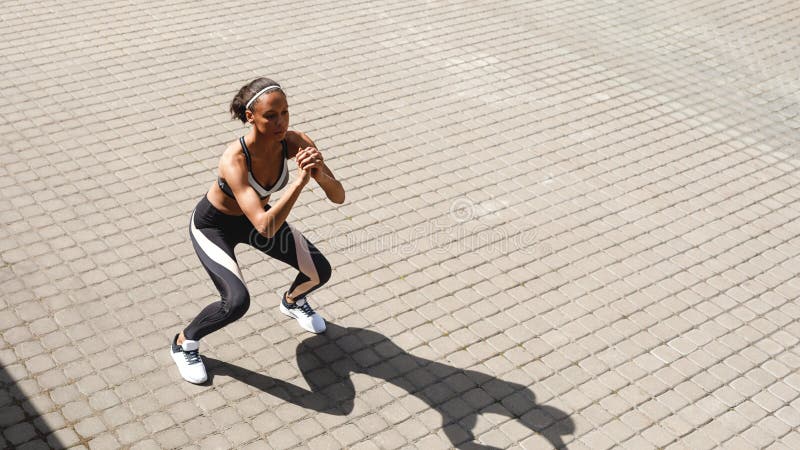 High Angle View of a Woman Doing Sit Ups Outdoors Stock Photo - Image ...
