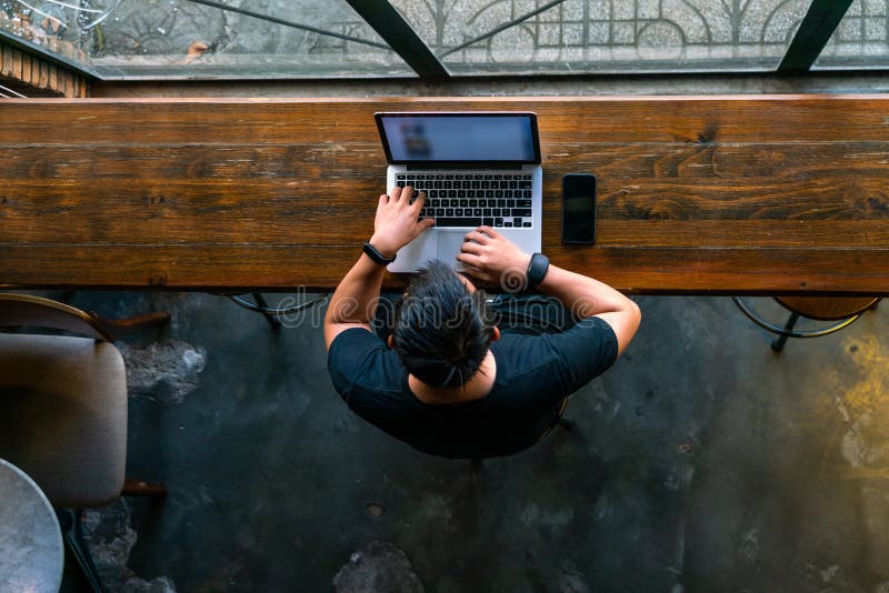 High Angle View of Man Using Laptop Stock Image - Image of overhead ...